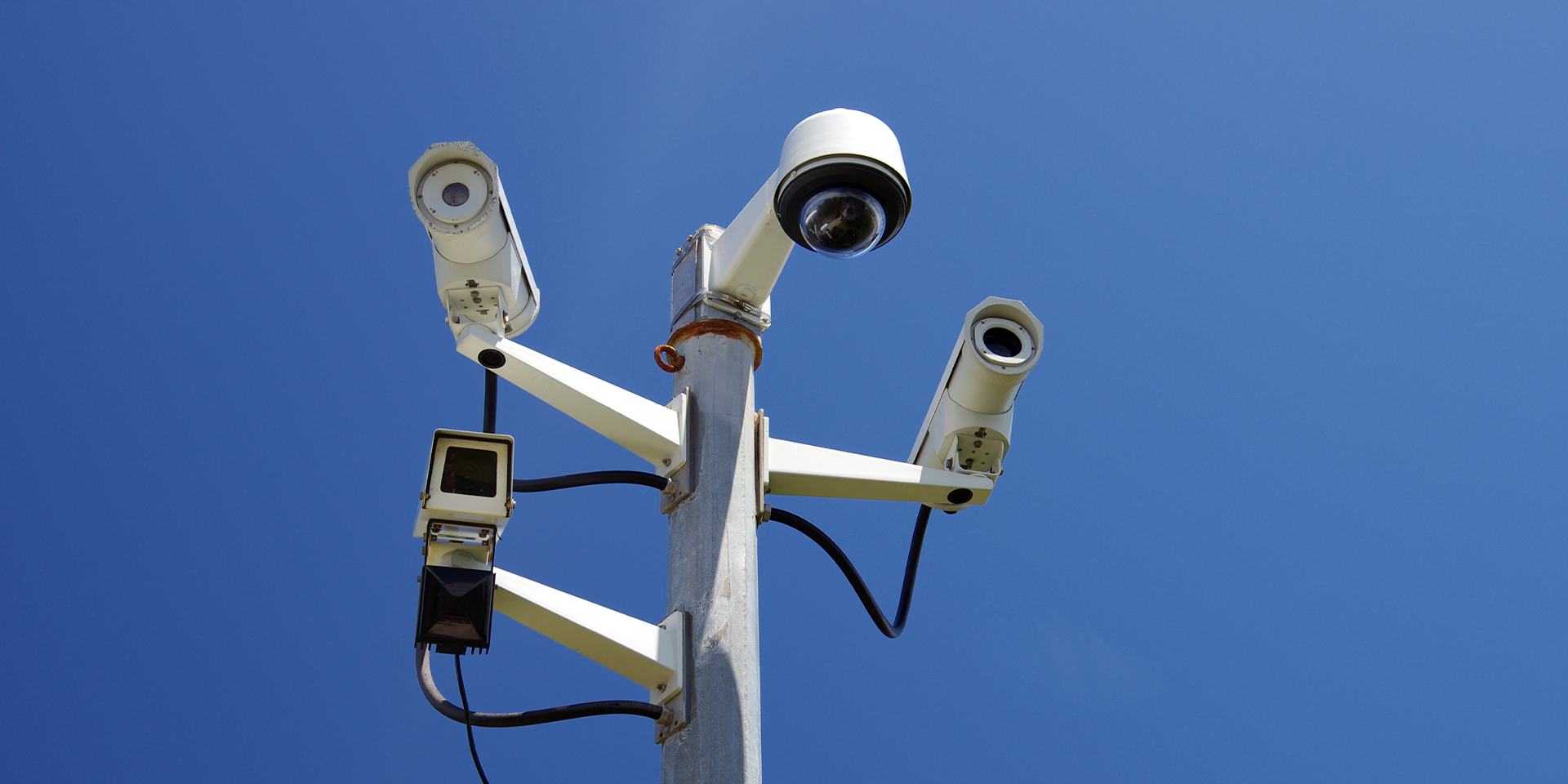 Risk mitigation with surveillance devices: insurance impacts
